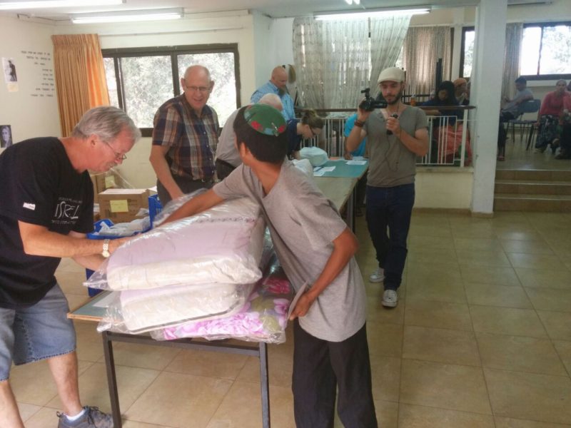 Bnei Menashe receive needed items at Kfar Hasidim - Shavei Israel