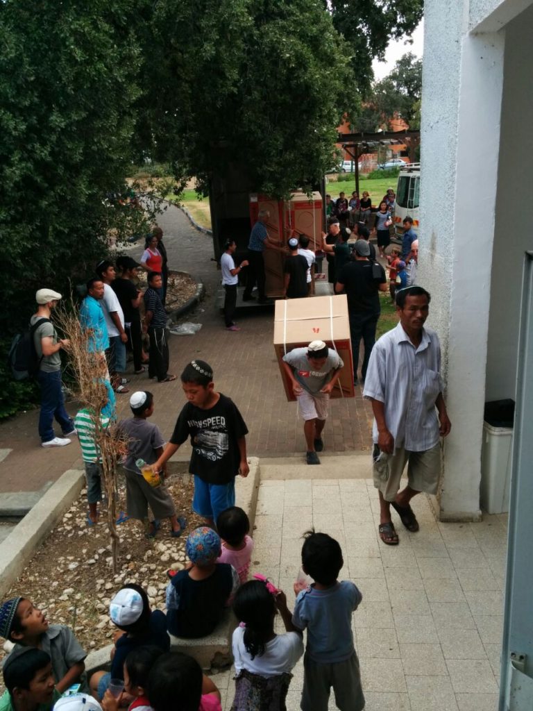 Bnei Menashe receive needed items at Kfar Hasidim - Shavei Israel